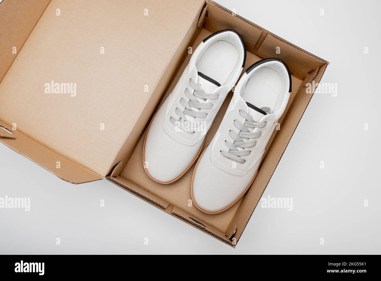 New white shoes in box. Casual man shoes on white background Stock ...