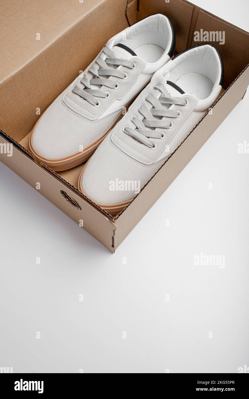 New white shoes in box. Casual man shoes on white background Stock ...