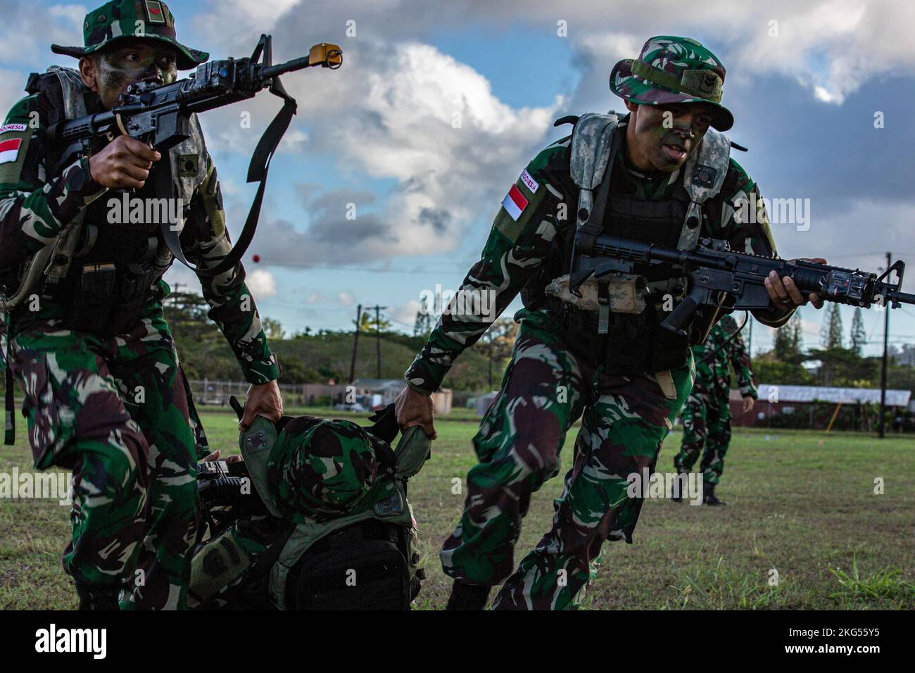 Maneuver team company soldiers assigned to the indonesian army tentara ...
