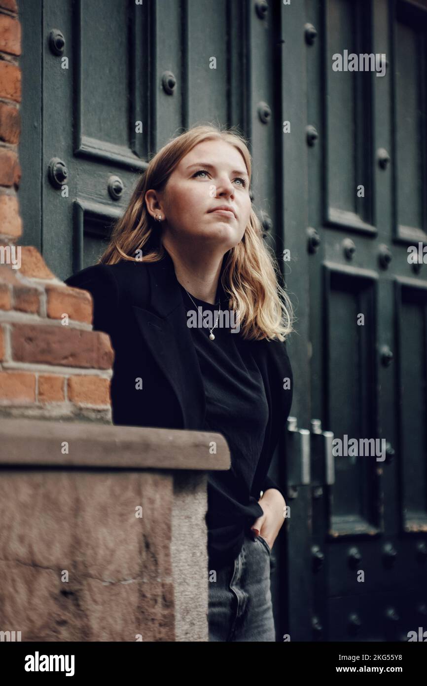 Lady standing at corner hi-res stock photography and images - Alamy