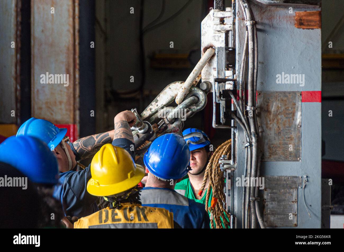 221031-N-ER894-1072 PHILIPPINE SEA (Oct. 31, 2022) Sailors attach a ...