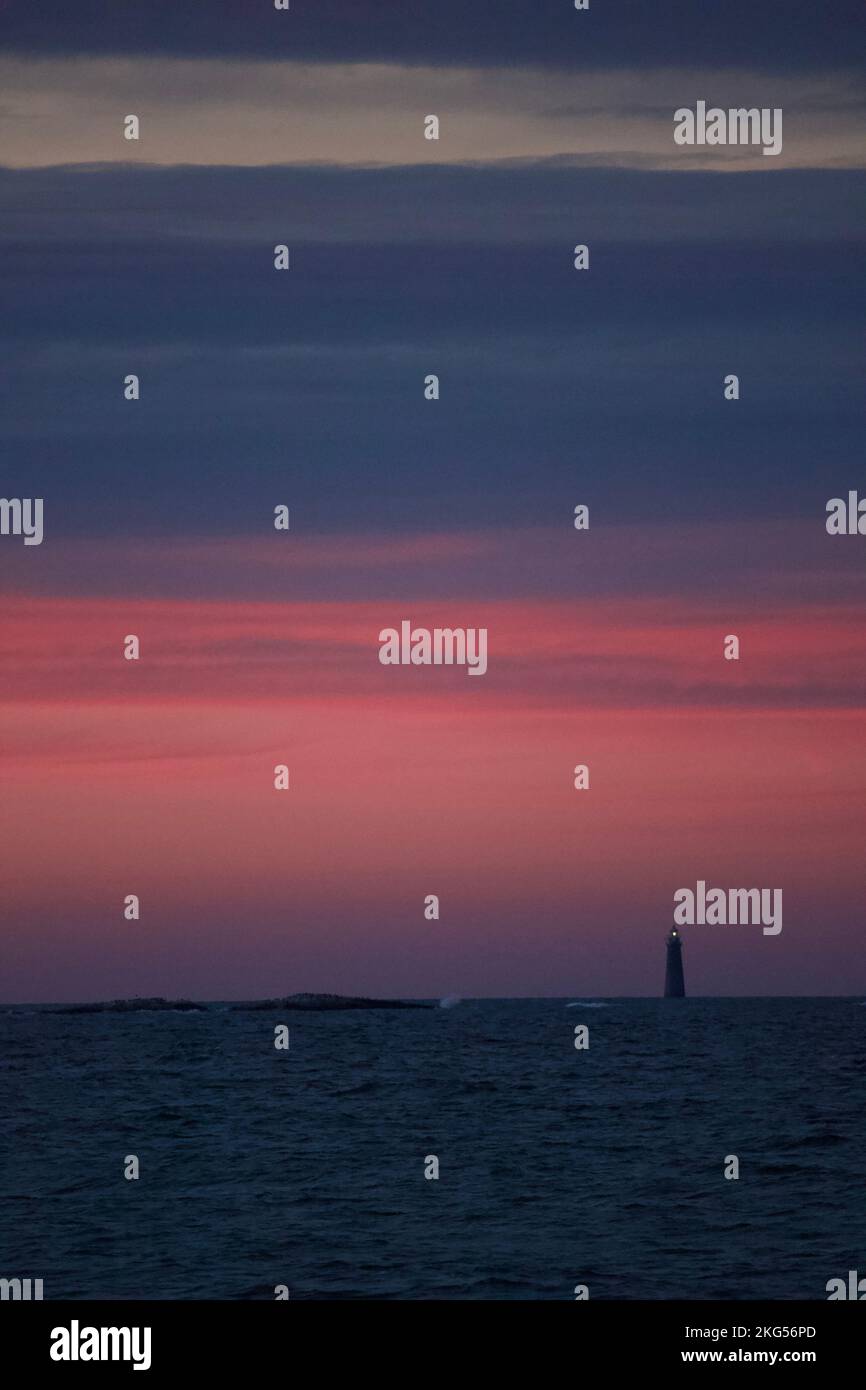 sunset with lighthouse Stock Photo - Alamy