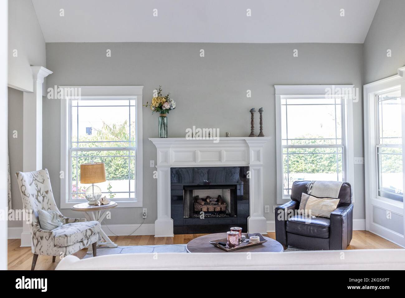 A light and bright open concept living room den with vaulted ceilings ...