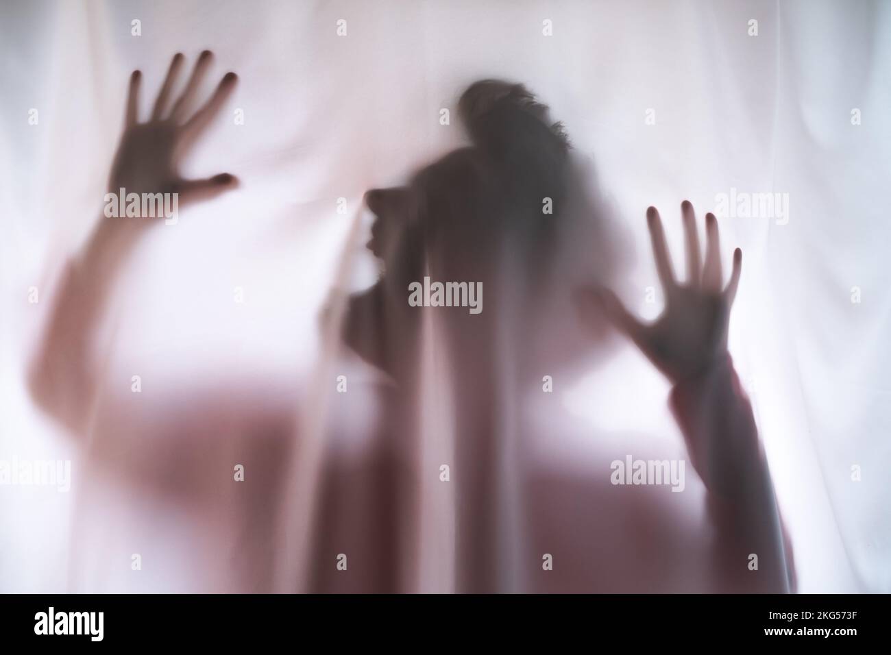 Depressed Man with mantal problems hiding above the curtain Stock Photo ...