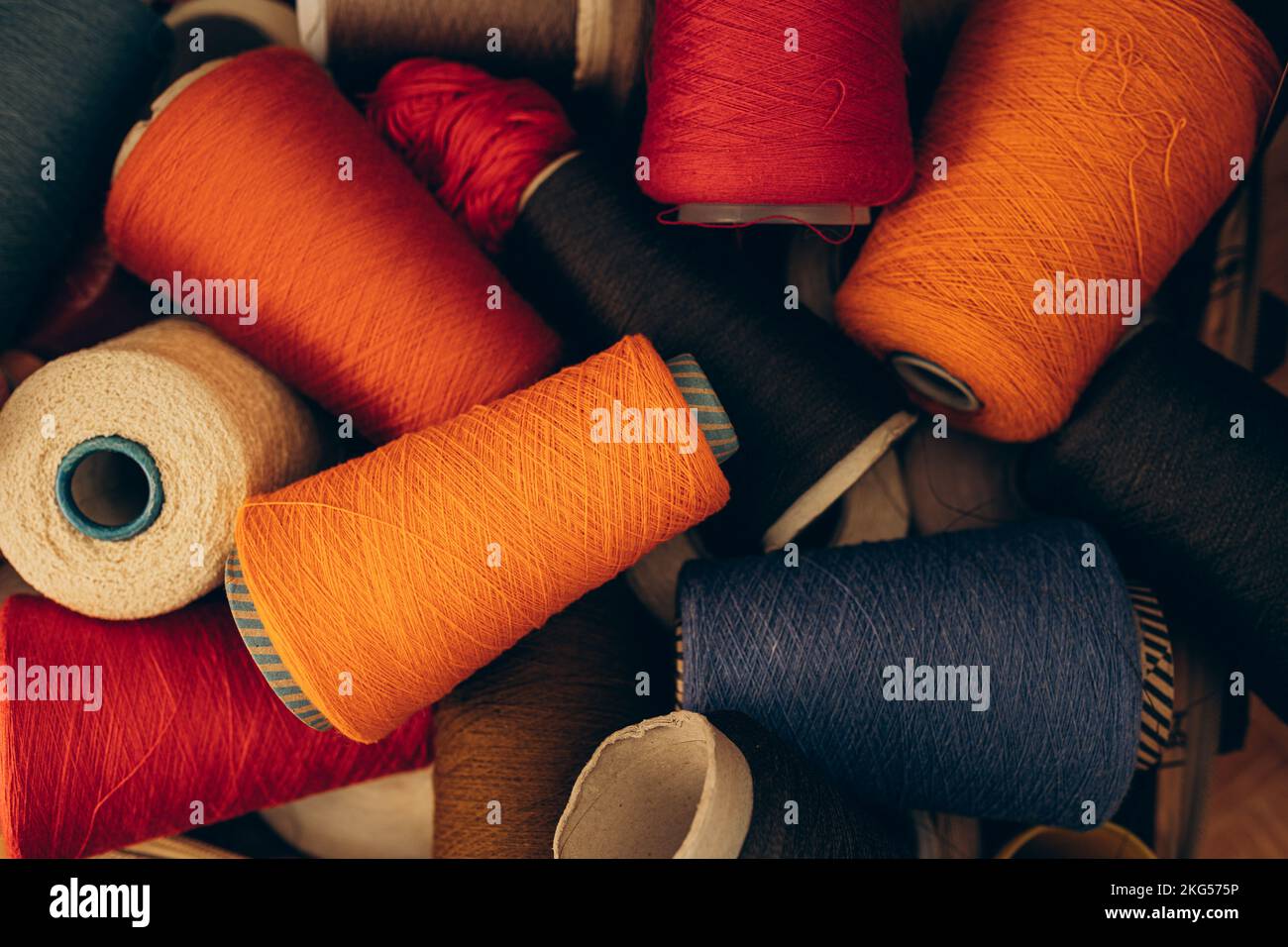 Composition of colorful vibrant wool threads from above. Autumn colours ...