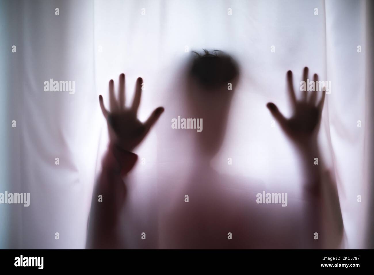 Depressed Man with mantal problems hiding above the curtain Stock Photo ...