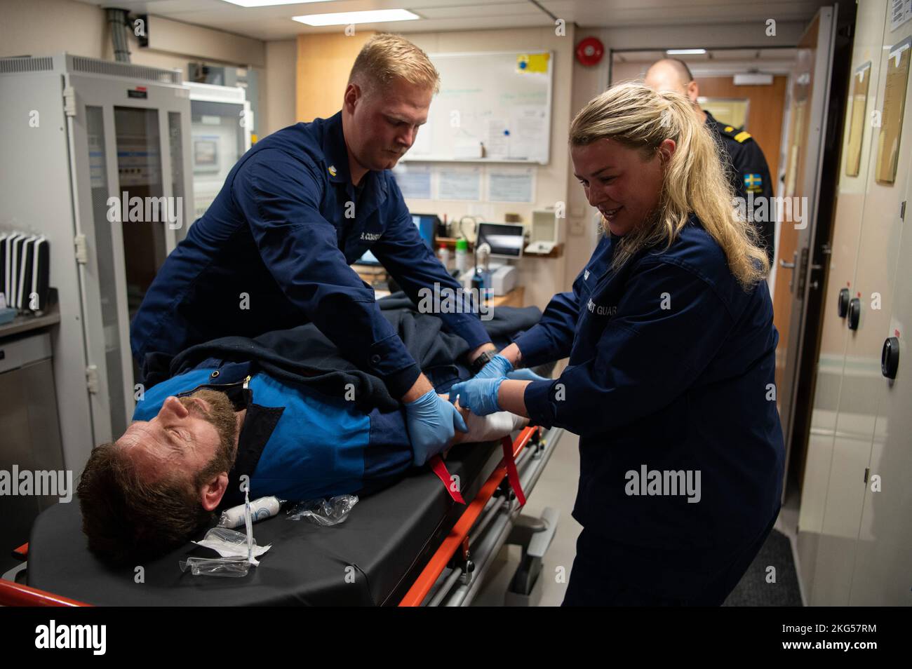 U.S. Coast Guard Petty Officer 2nd Class Matthew Anderson and Chief ...