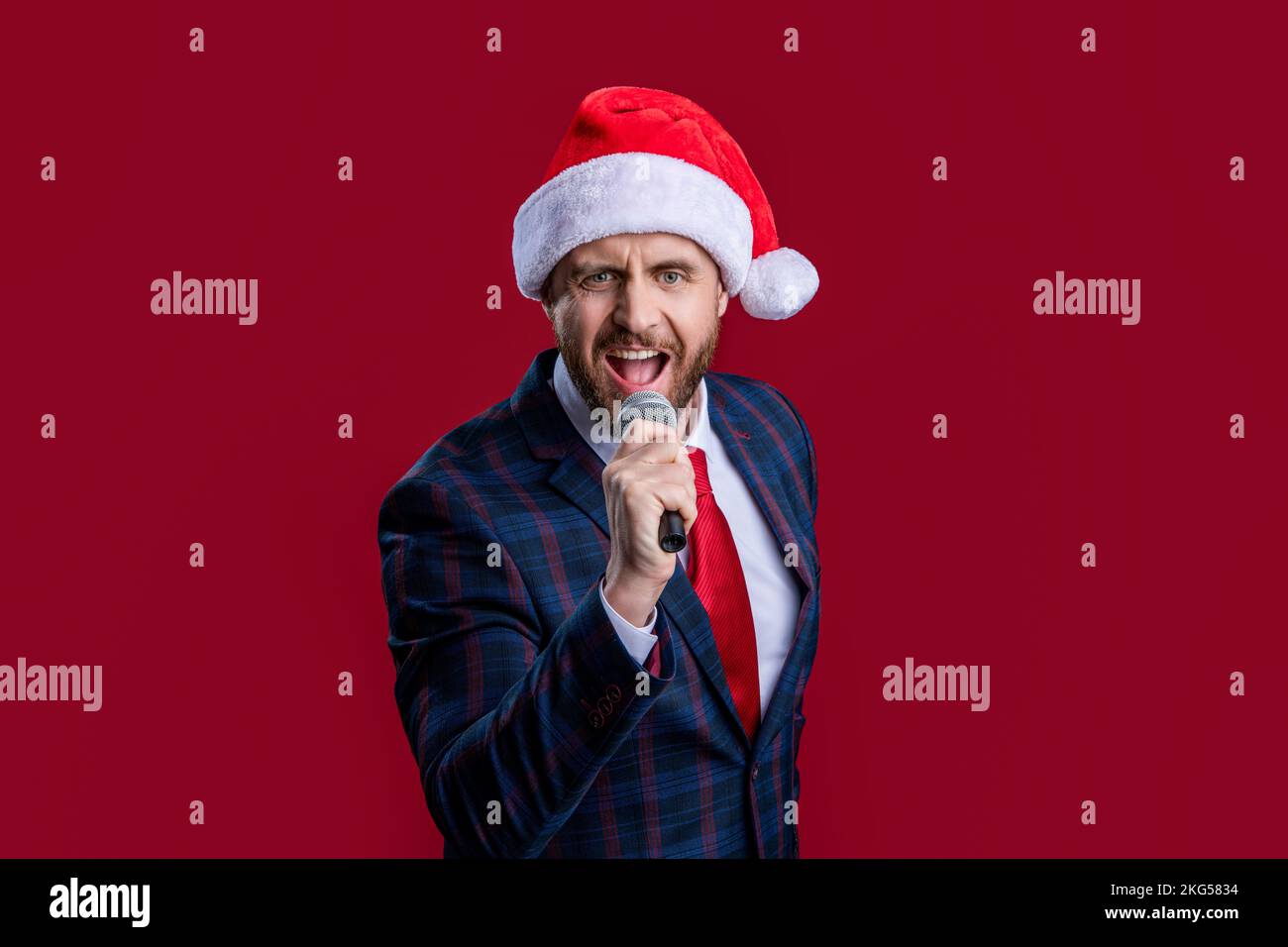 happy xmas event host man singing in santa hat. event host man singing ...