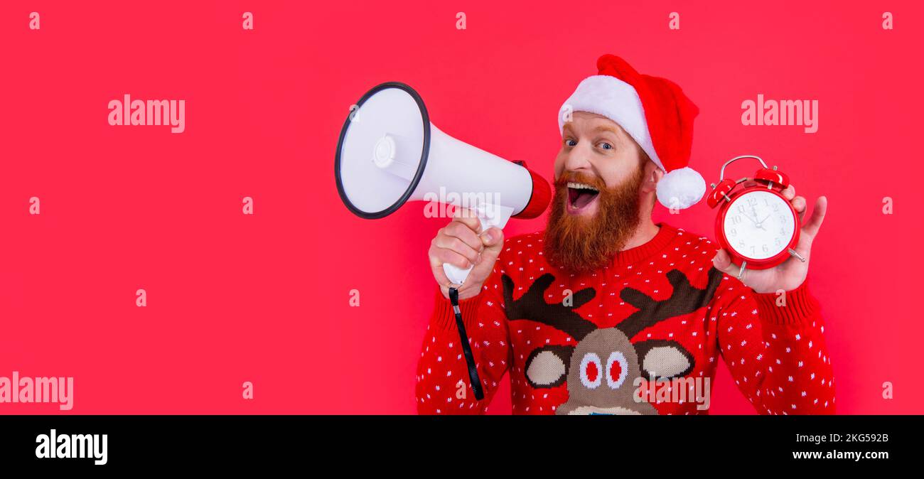 Bearded Santa Claus shouting to loudspeaker holding clock. Christmas ...