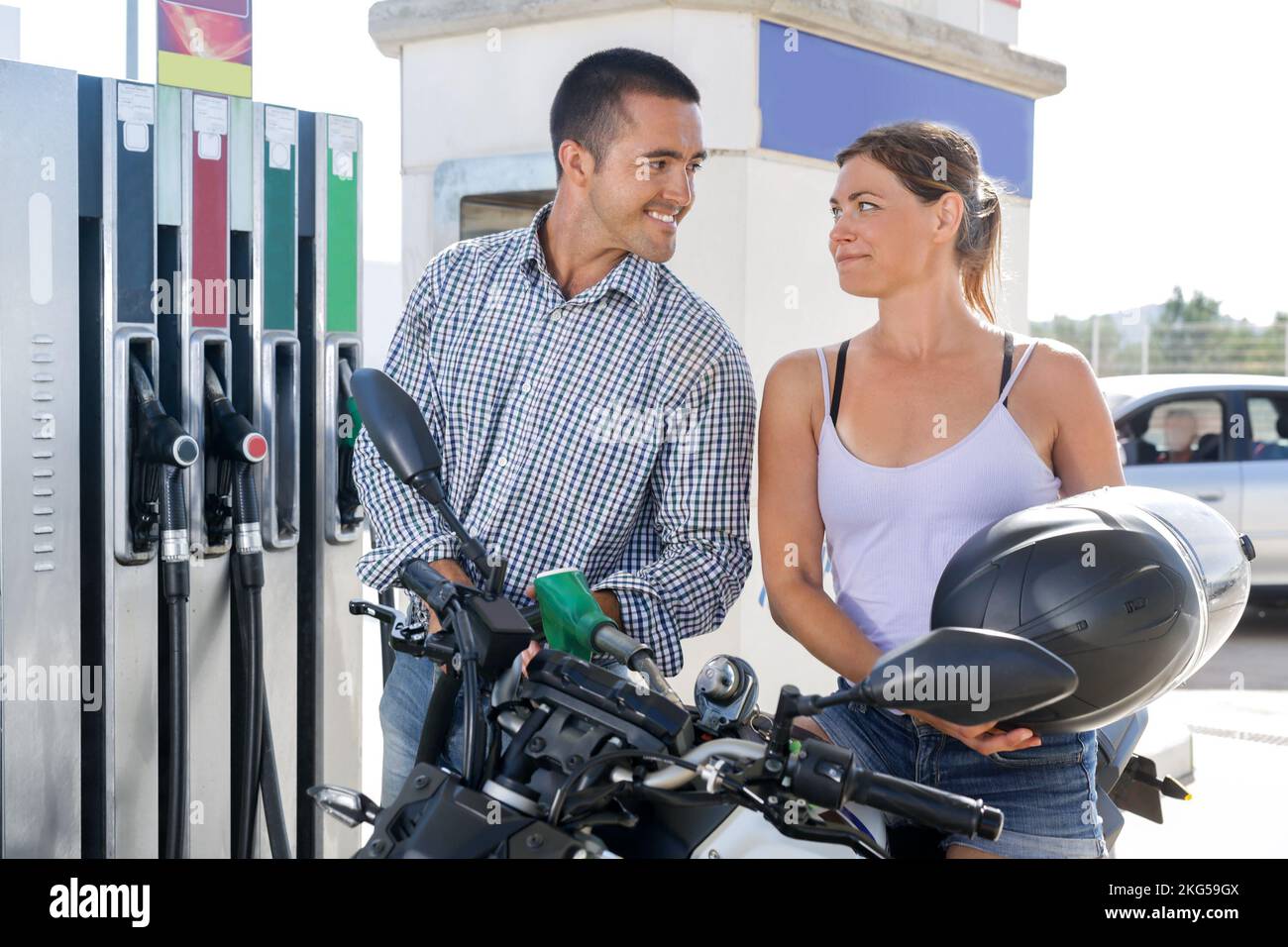 Filling motorcycle tank gas station hi-res stock photography and images ...