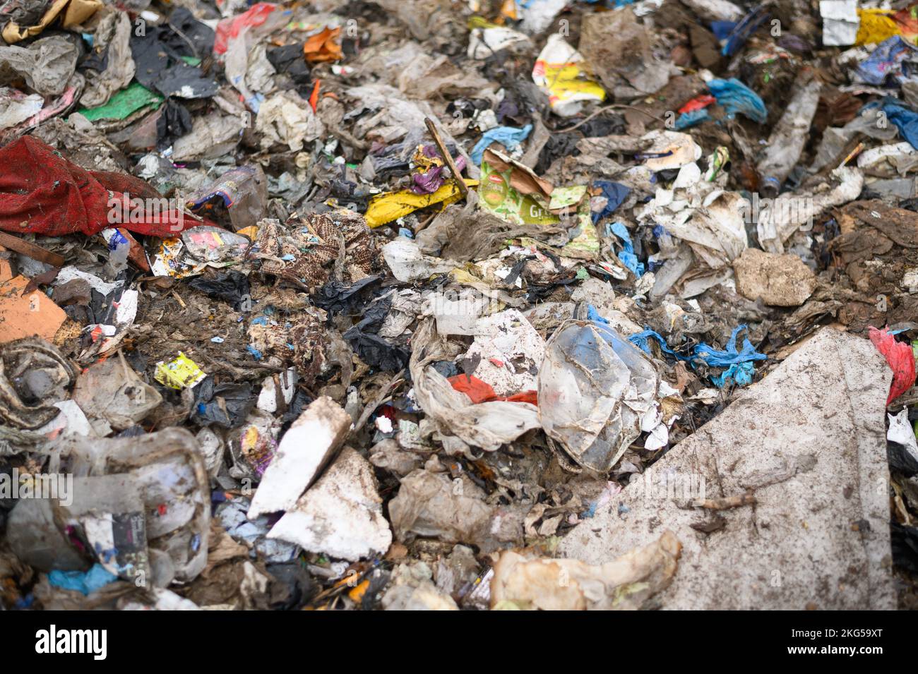 Garbage dump at waste processing site. Environment pollution concept ...