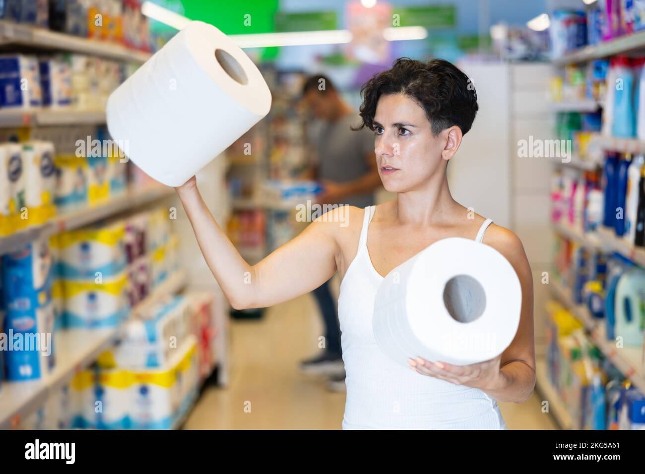 Woman toilet paper supermarket hi-res stock photography and images - Alamy