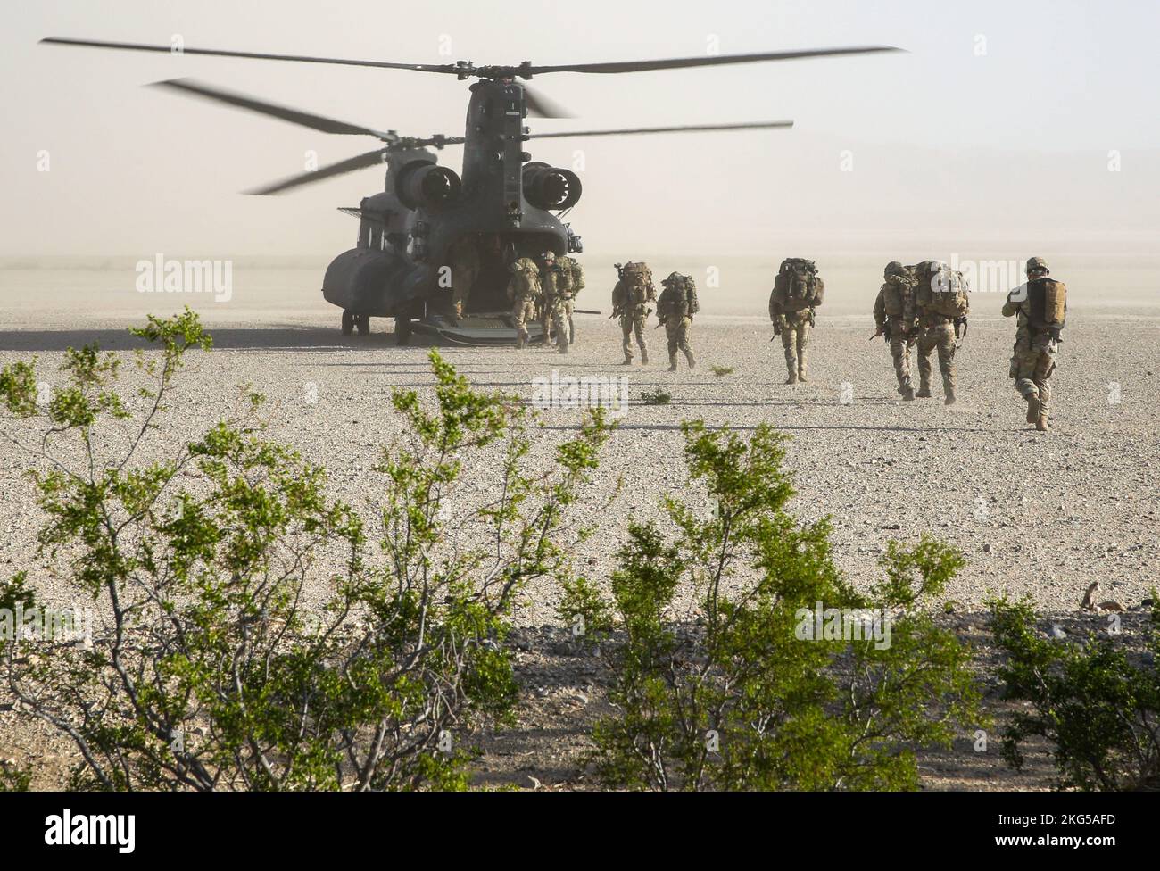 Members of the U.S. Army 7th Special Forces Group board a CH-47 Chinook ...
