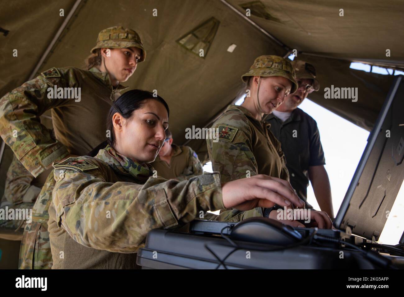 Australian Army Soldiers, assigned to the 2nd Health Battalion, work ...