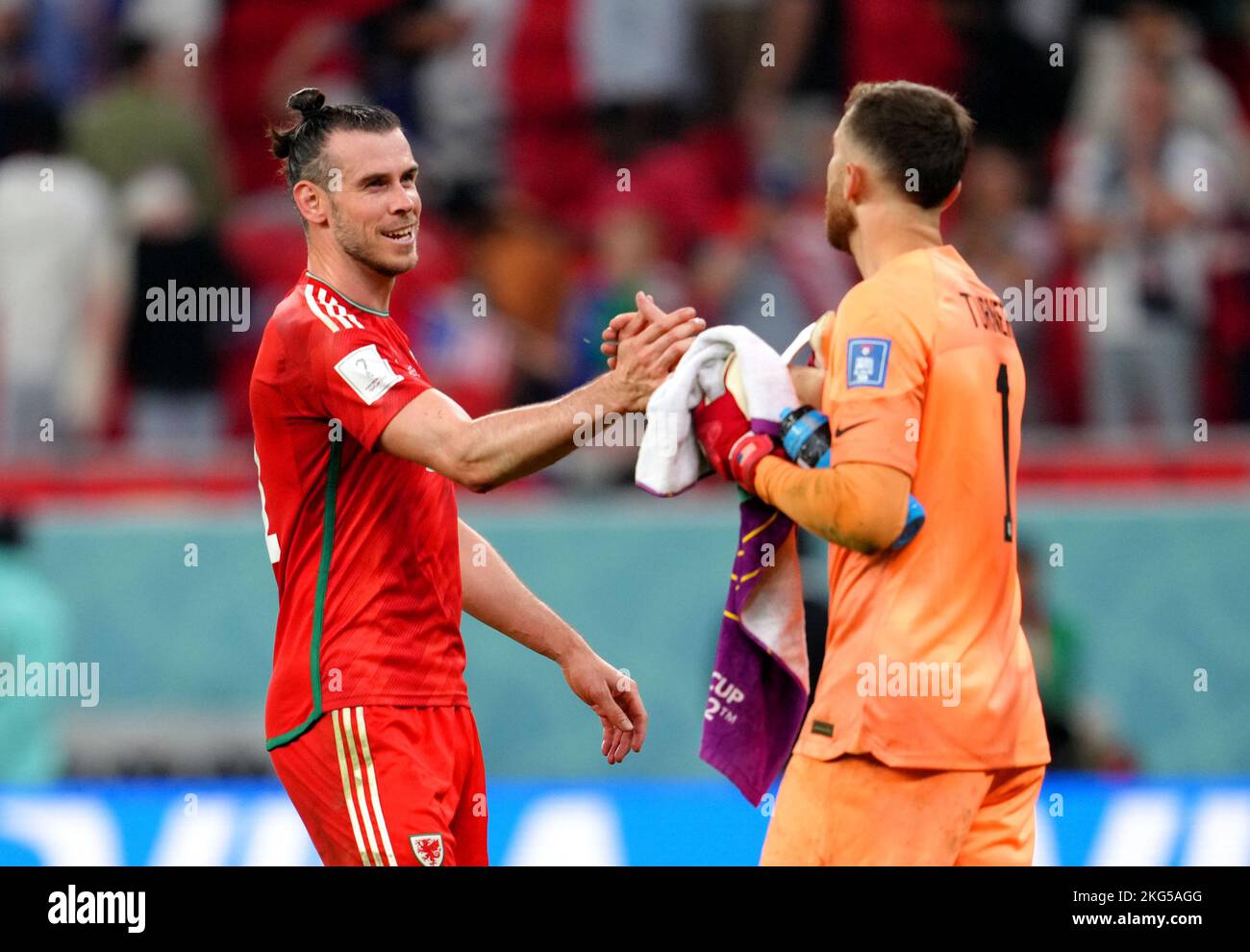 Wales' Gareth Bale (left) shakes hands with USA goalkeeper Matt Turner ...