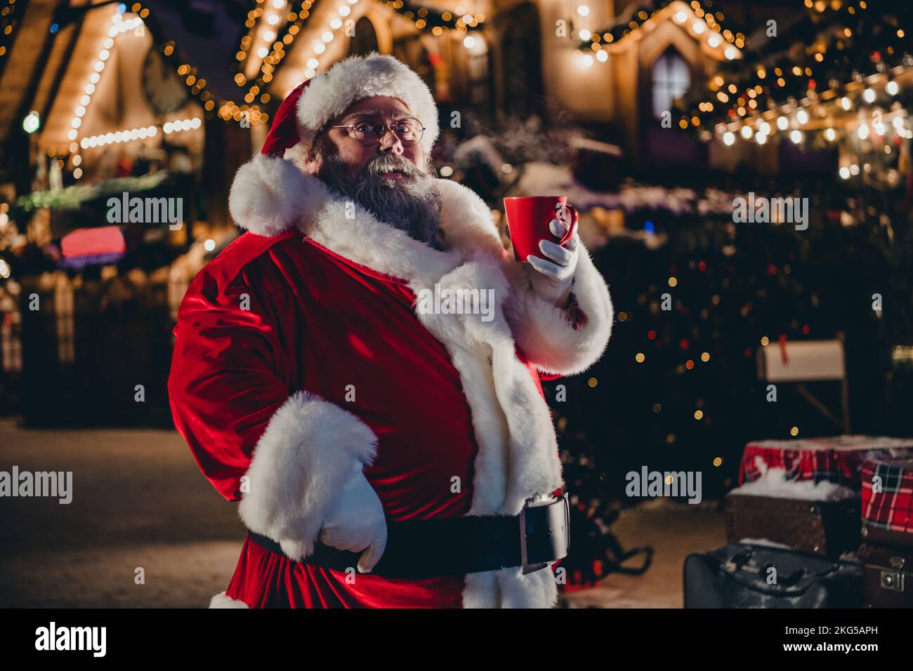 Photo of cool big santa clause wear comfort warm coat hat enjoy ...