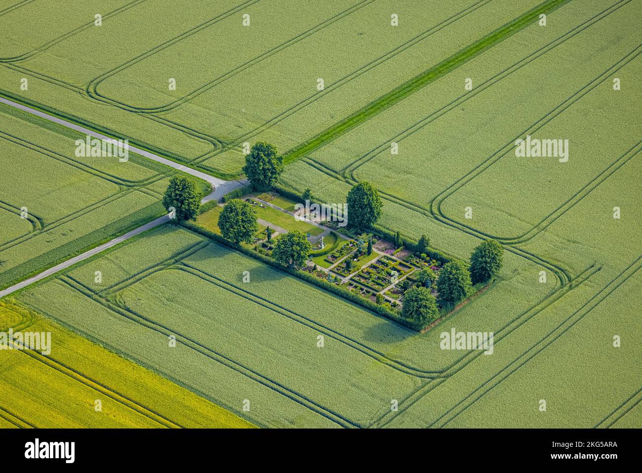 Aerial view, cemetery Wambeln, shape and color with trees surrounded by ...