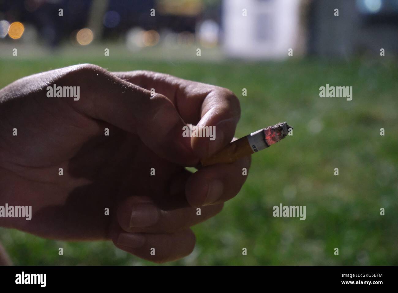 Smoking smoker cigarette smoke fire hi-res stock photography and images ...