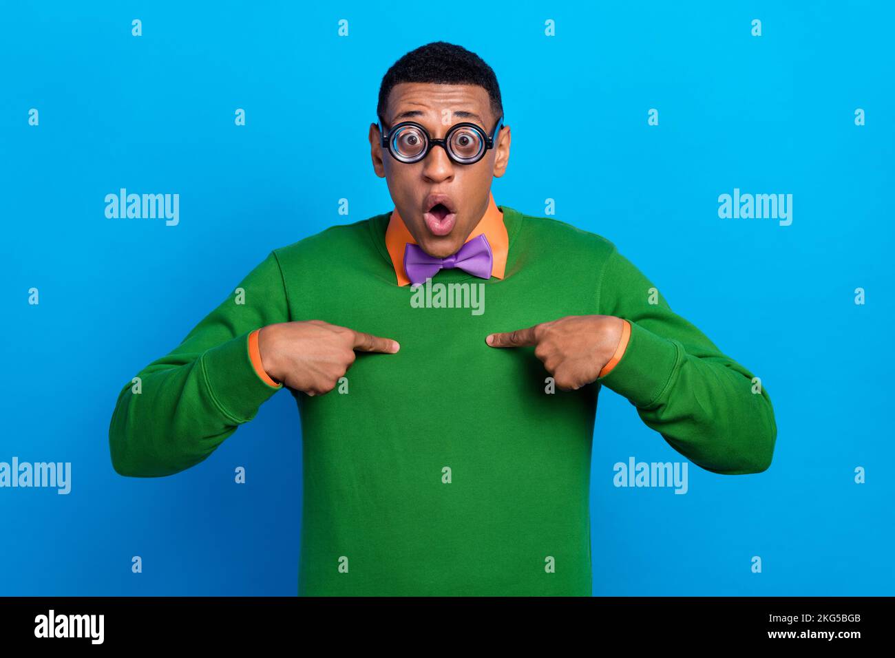 Closeup photo of young funny questioned guy wear green jumper fingers ...