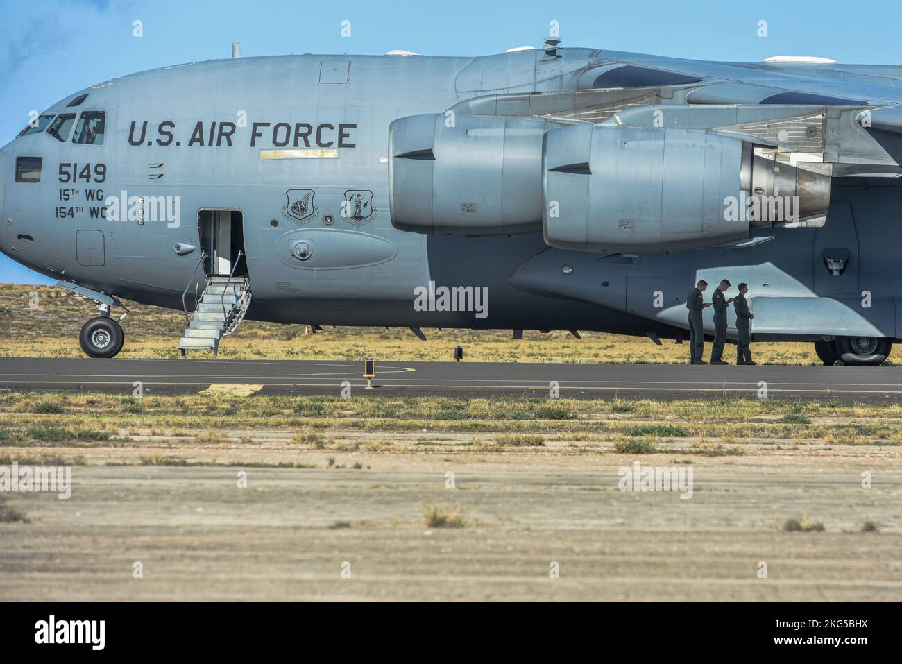 U.S. Air Force aircrew from the 535th Airlift Squadron review exercise ...