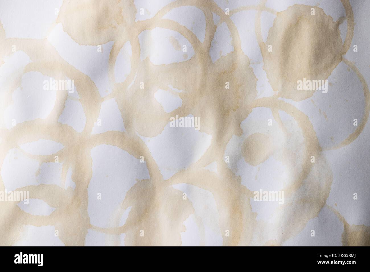 White stained piece of paper with copy space on white background Stock ...