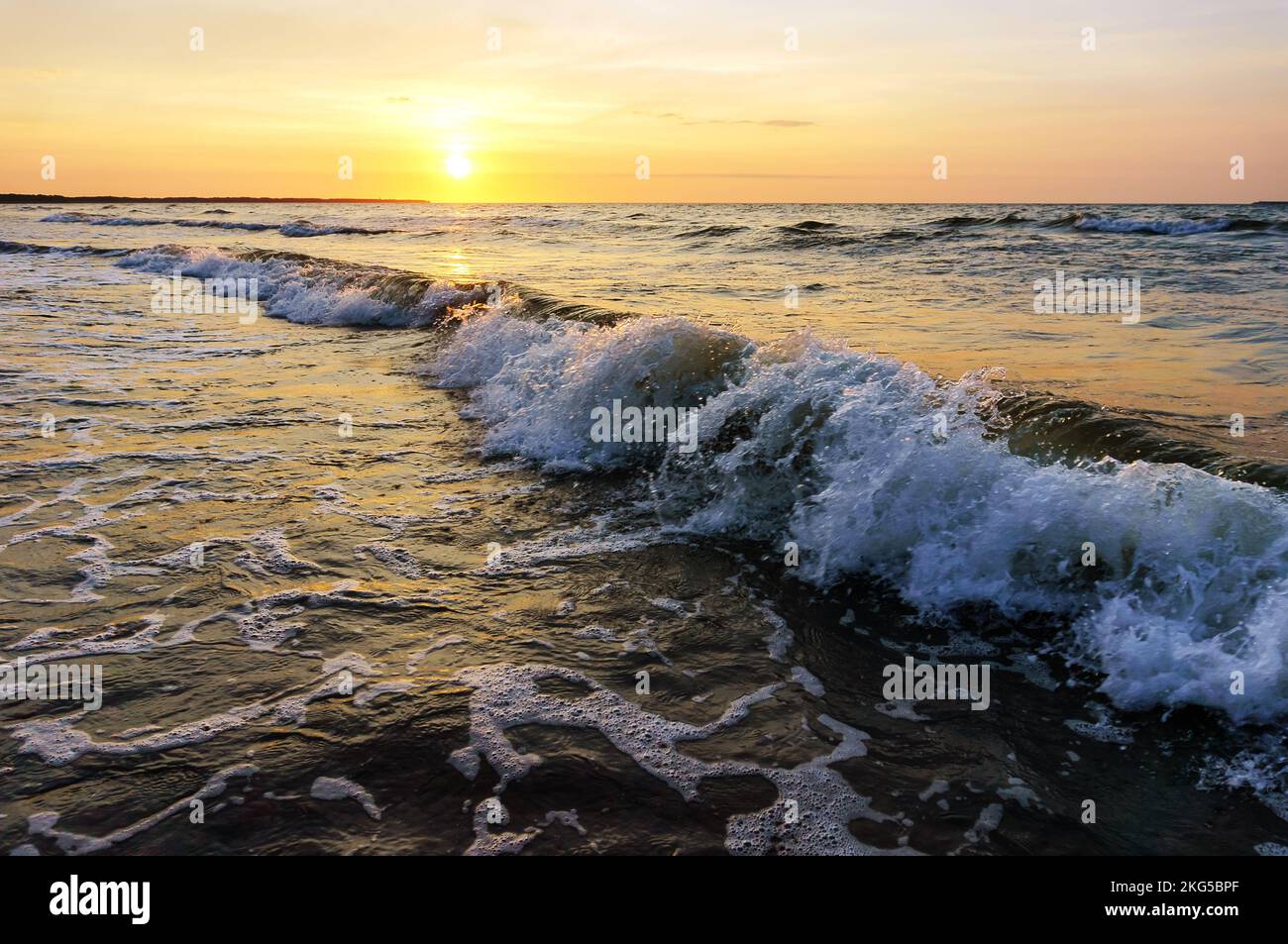 Sunset over the sea. Reflection of sunlight in the sea waves. The sky ...