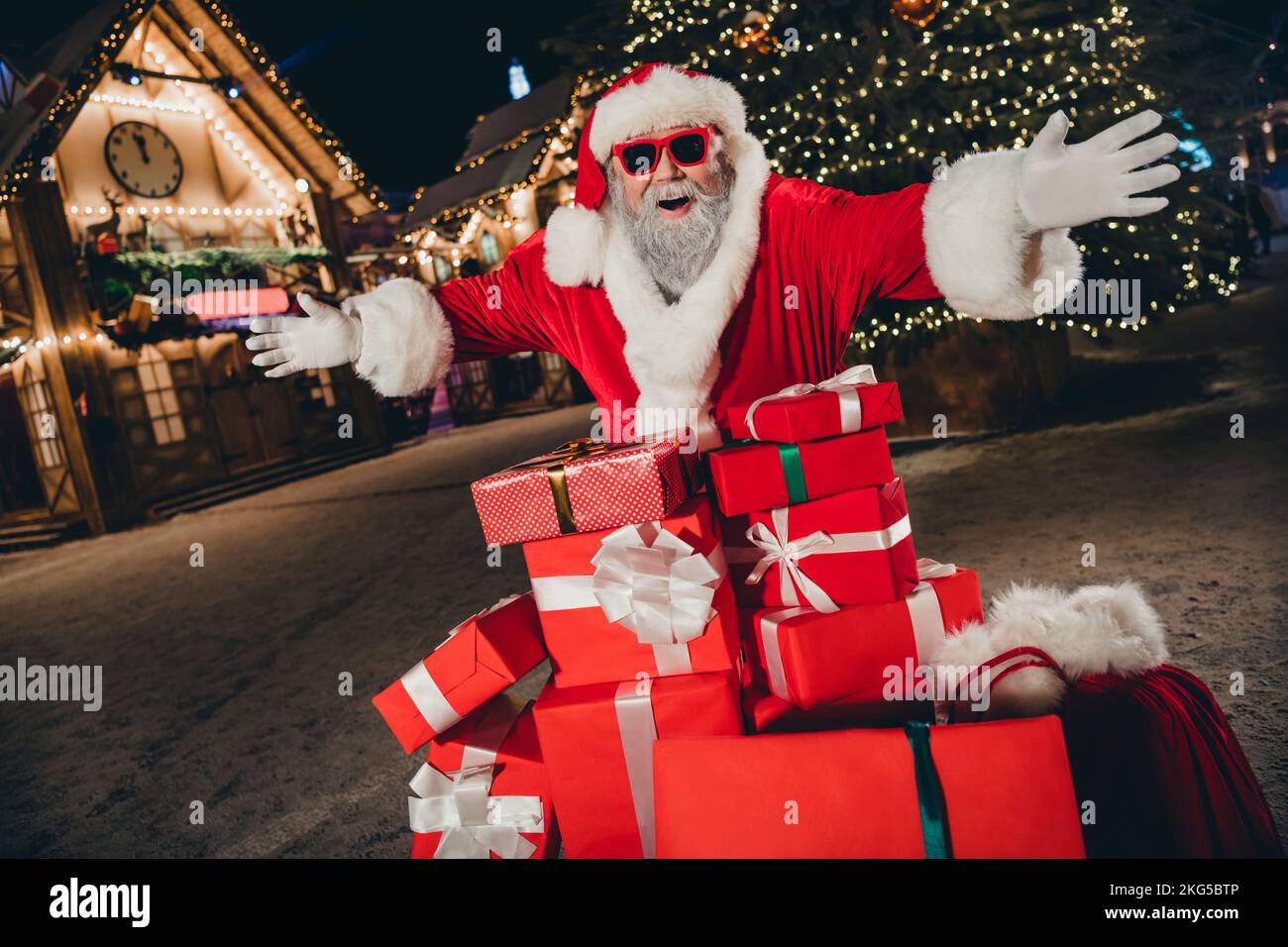 Giving christmas present to grandpa hi-res stock photography and images ...