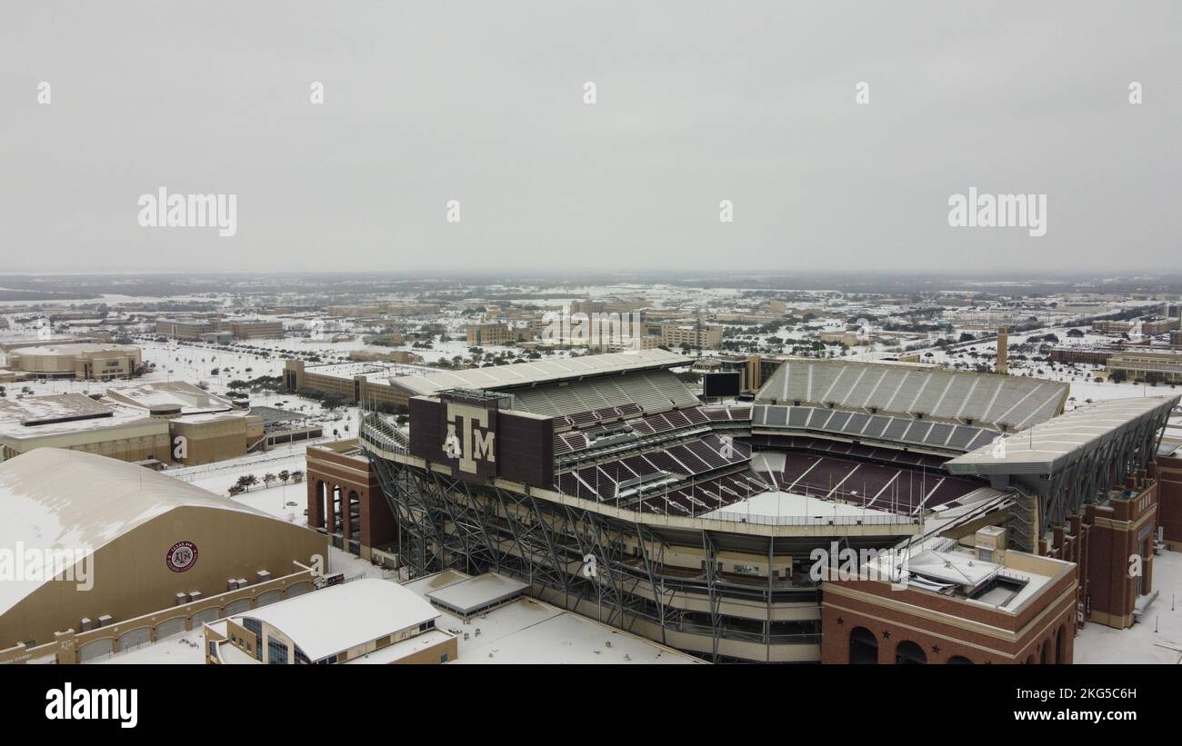 An aerial view of the Kyle Football Field covered in snow in College ...