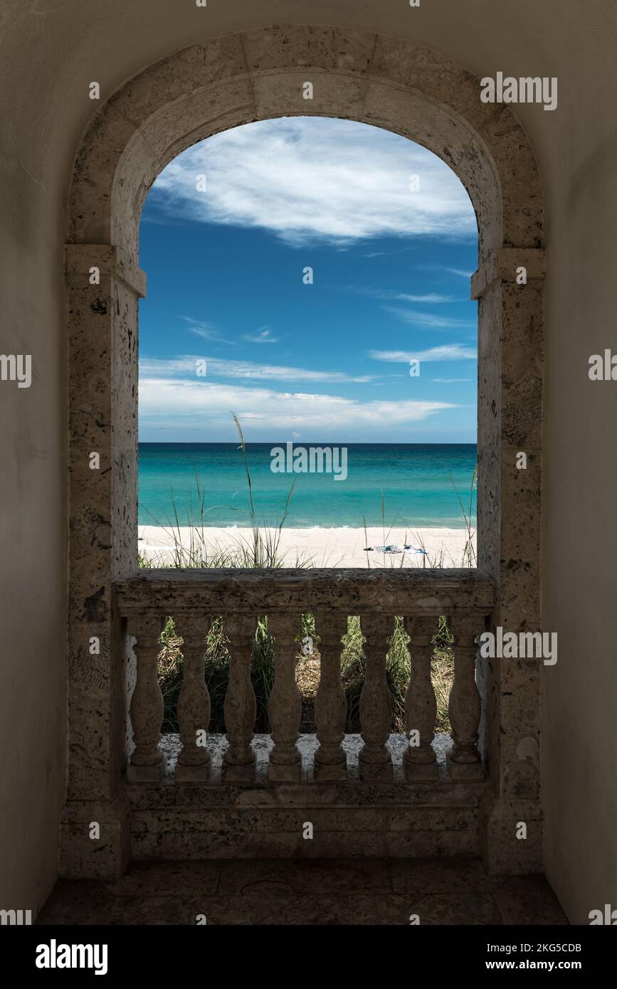An arch window overlooking the ocean in West Palm Beach, Florida, USA ...