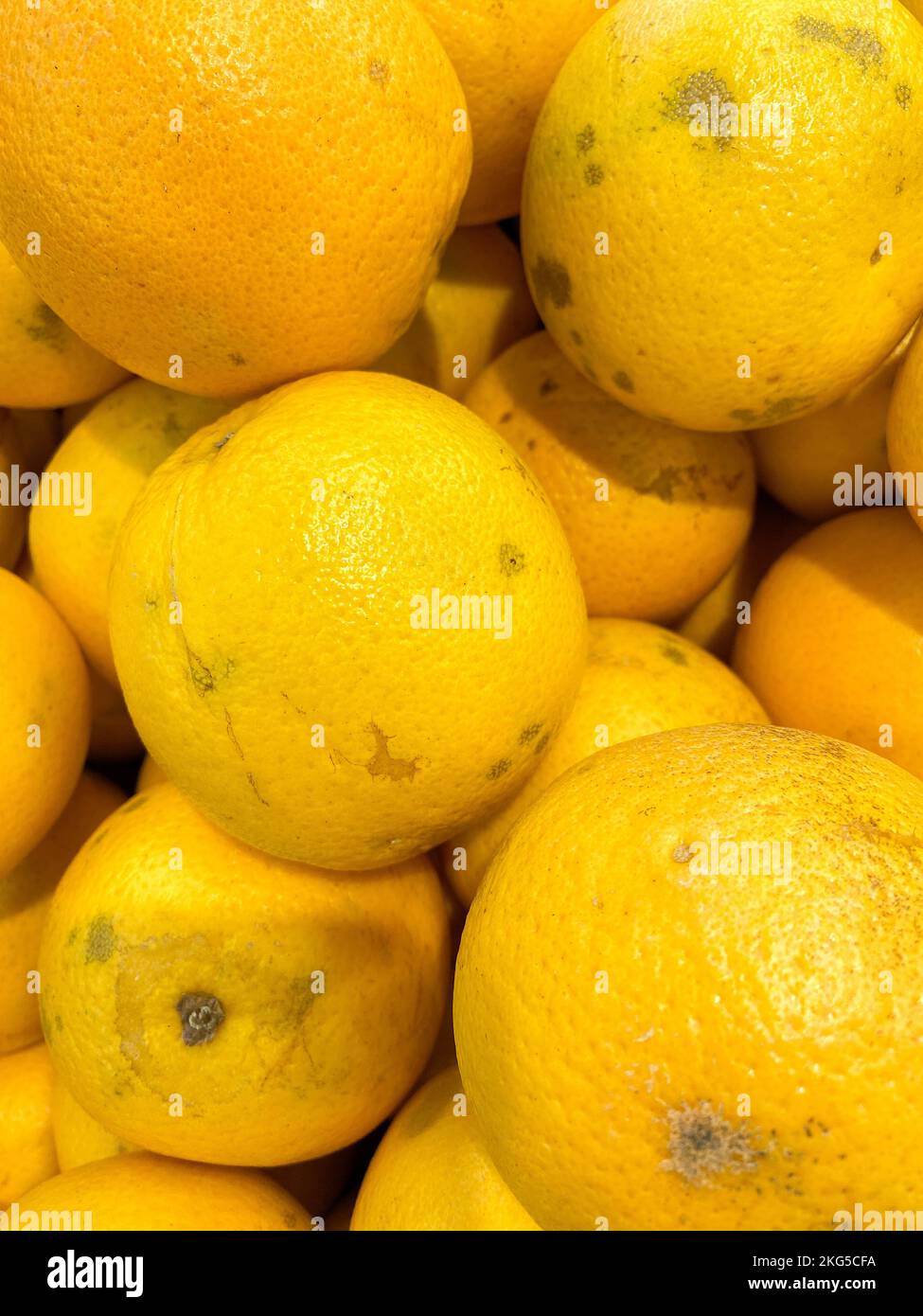 Fresh orange fruits as background, top view of orange on table, organic ...