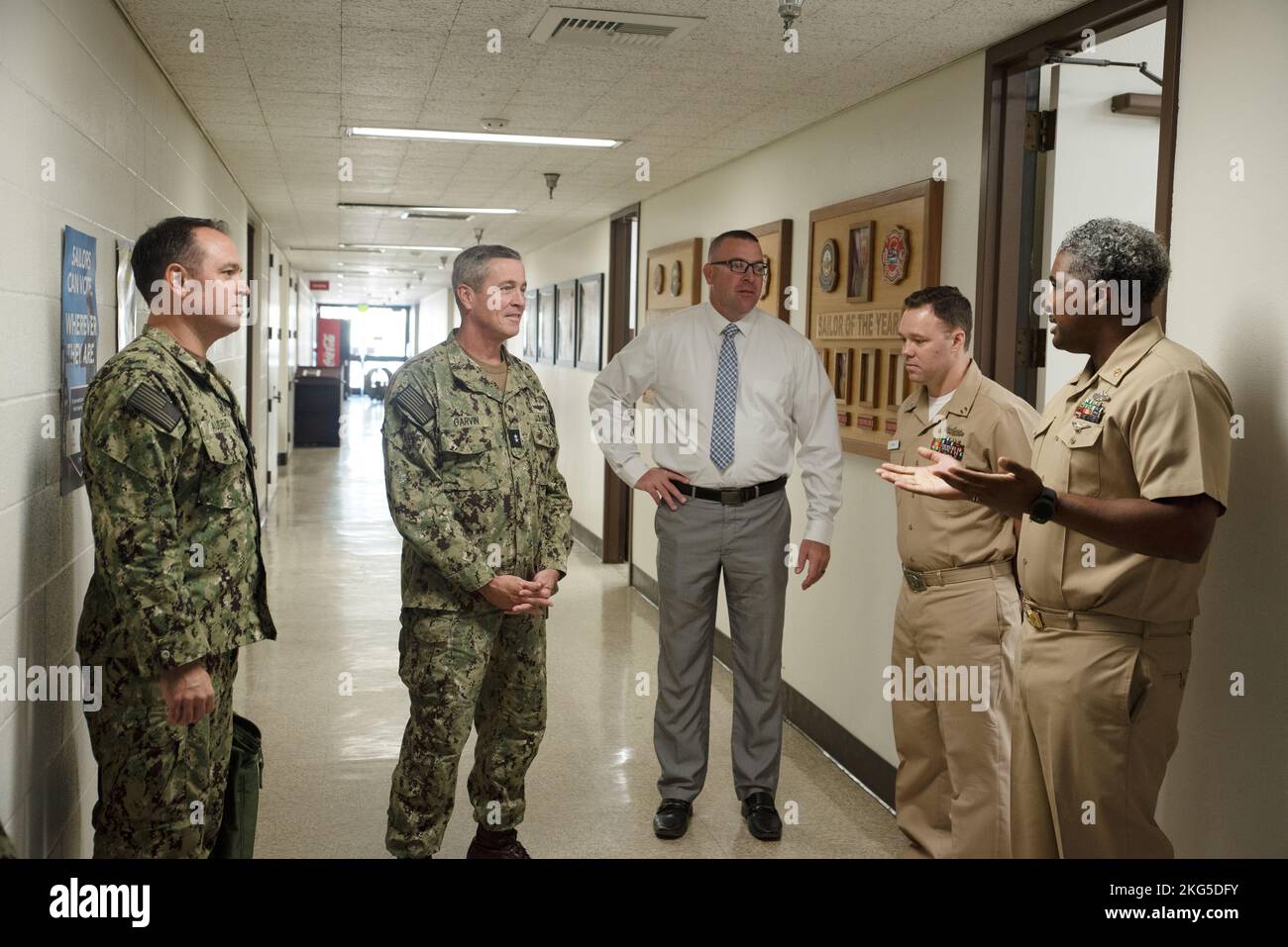 Rear Adm. Pete Garvin, center-left, commander, Naval Education and ...