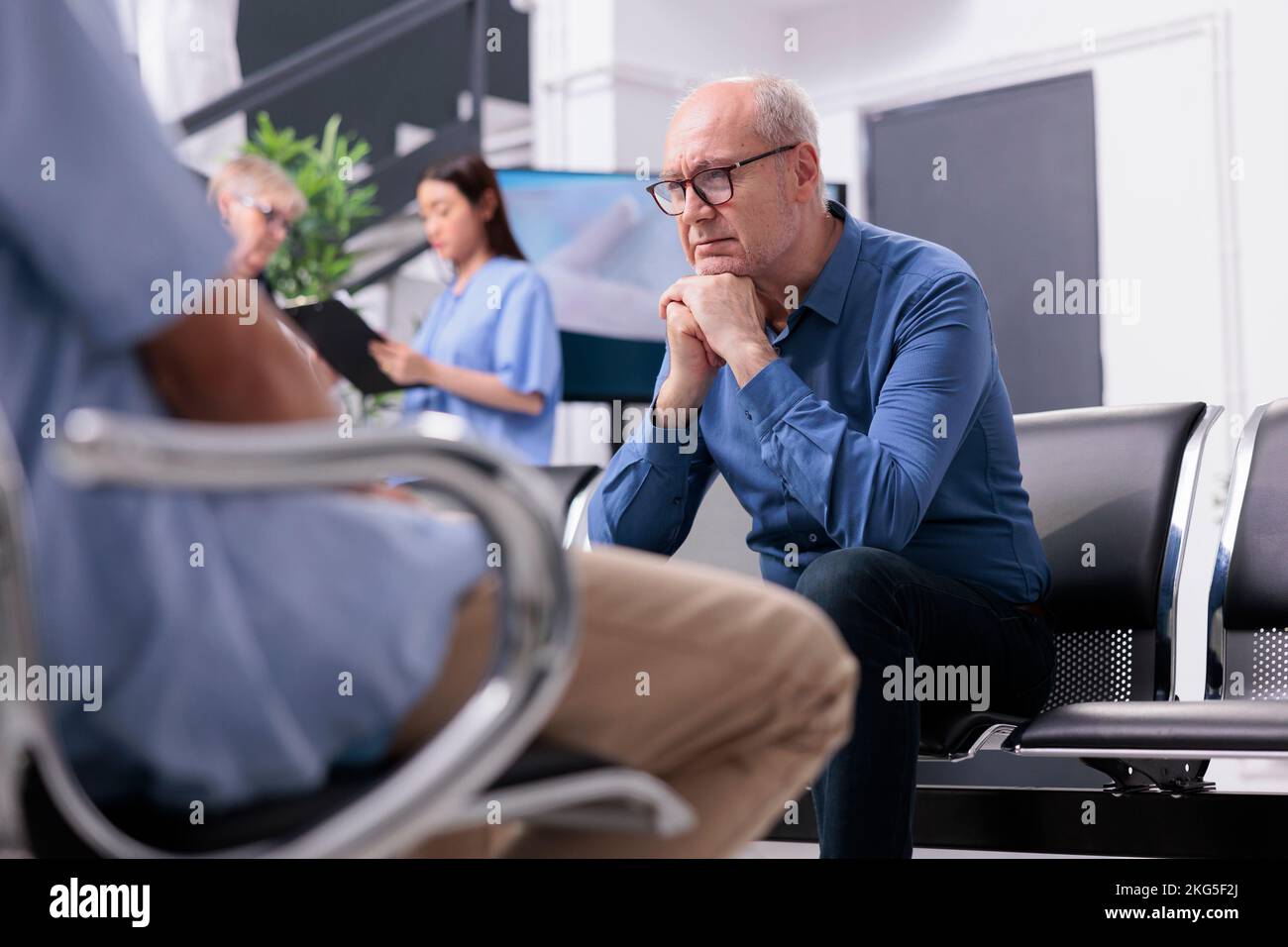 Stressed exhausted elderly patient waiting for disease expertise in ...