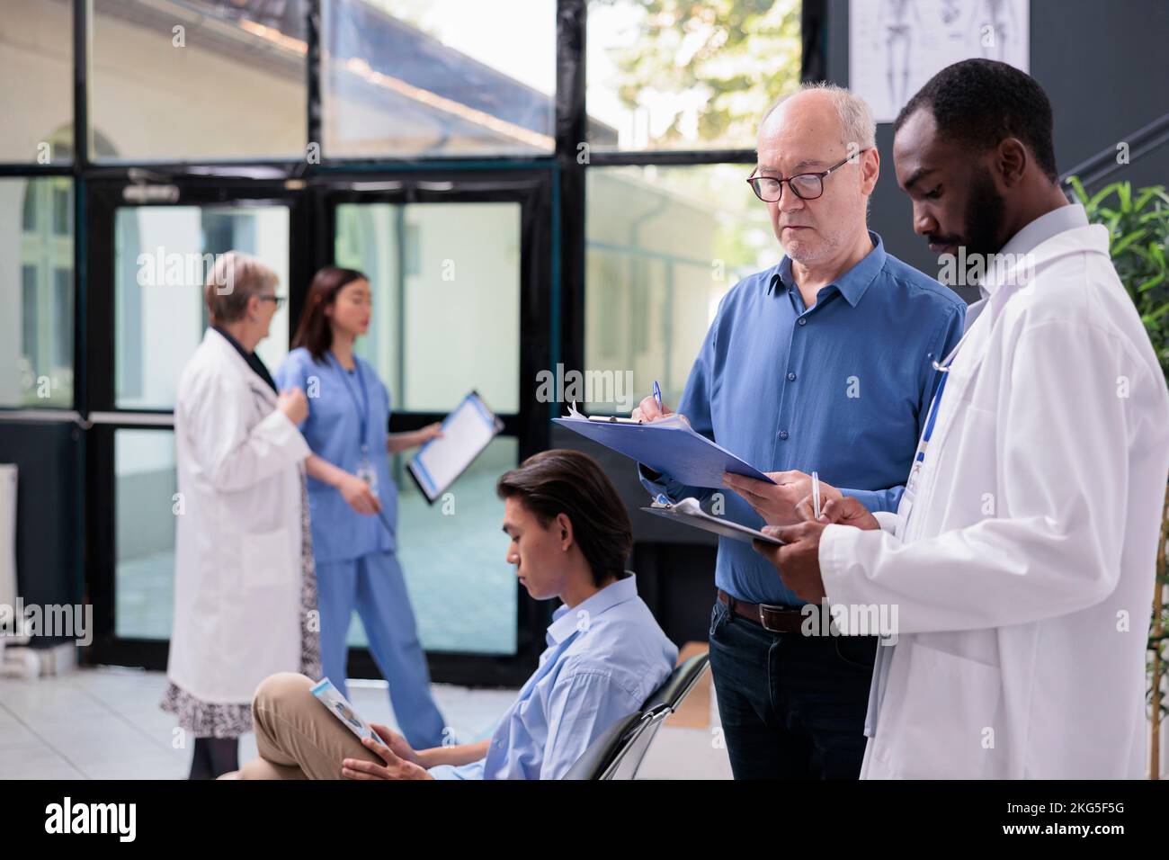 Physician medic showing illness diagnosis report to senior patient ...