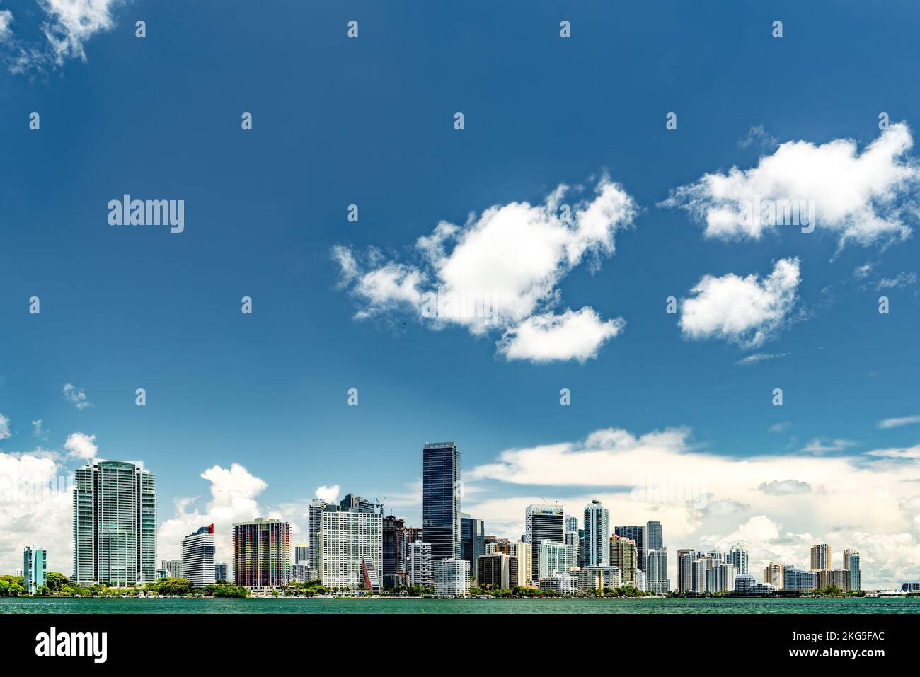 A scenic display of Miami skyline with its skyscrapers against the blue ...