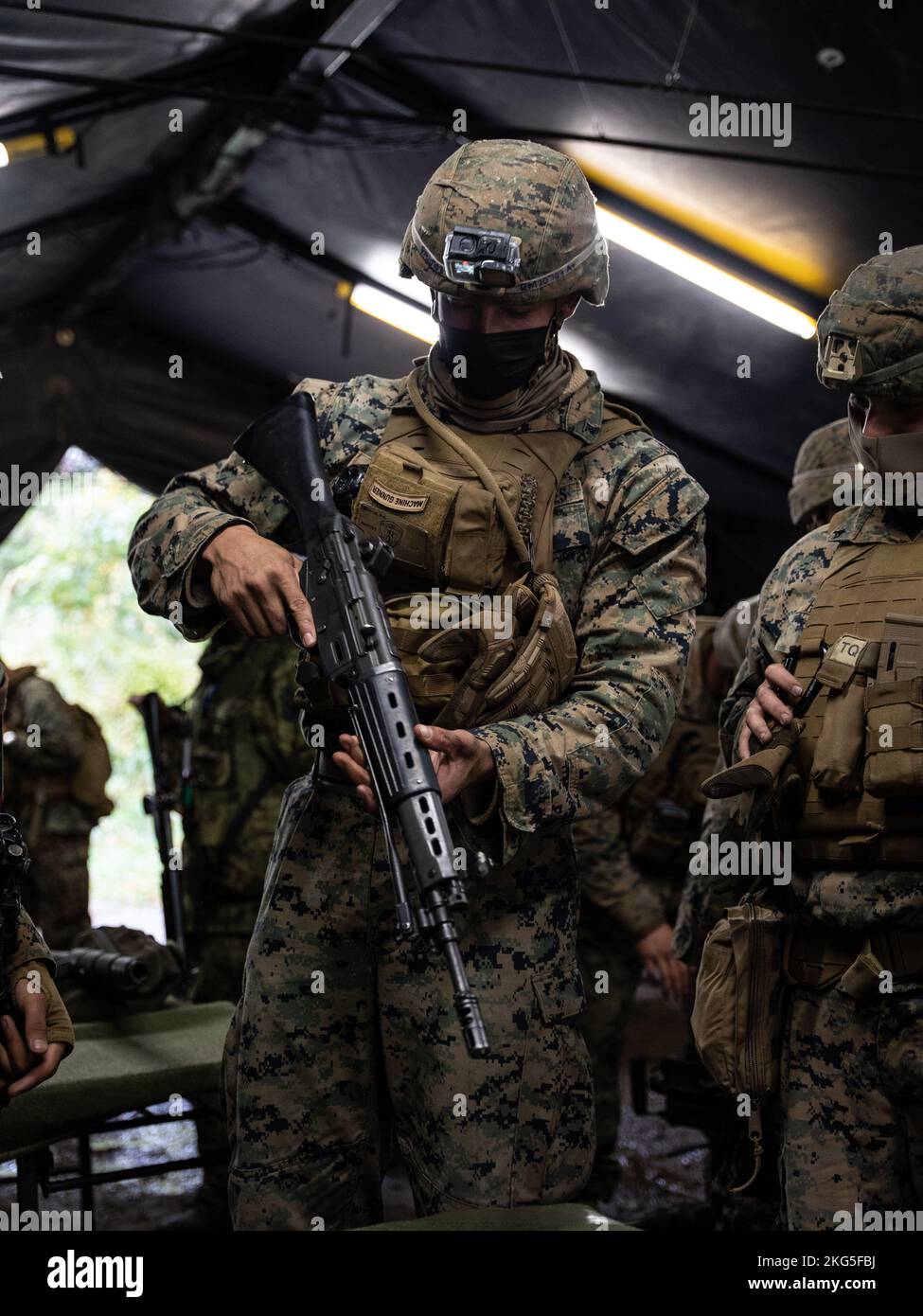 U.S. Marine Corps Lance Cpl. Riley Martin, a rifleman with 3rd ...