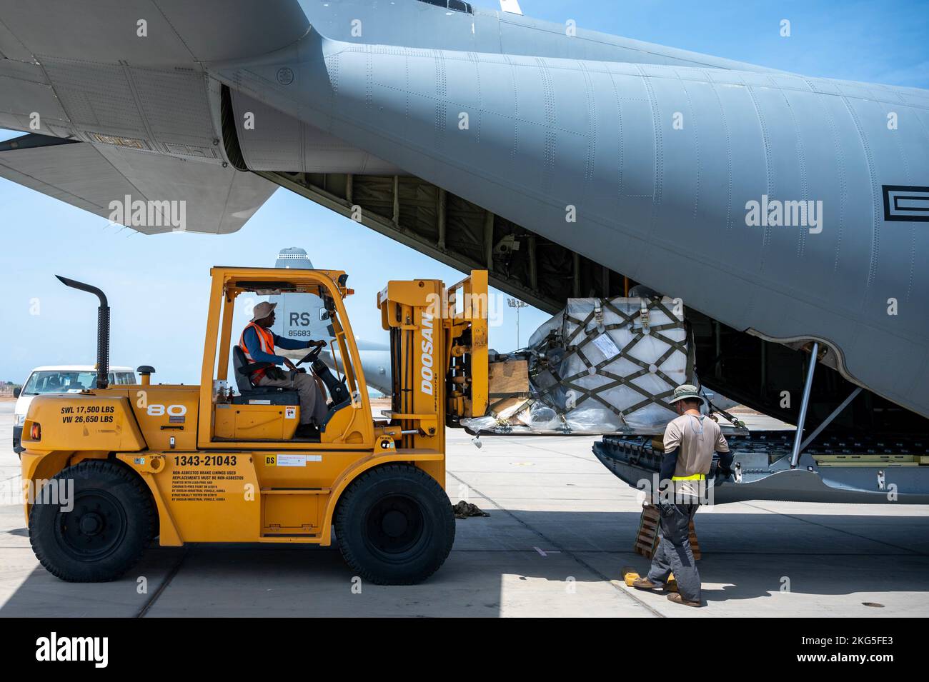 U.S. Air Force C-130J Super Hercules gets a pallet loaded onto it at ...