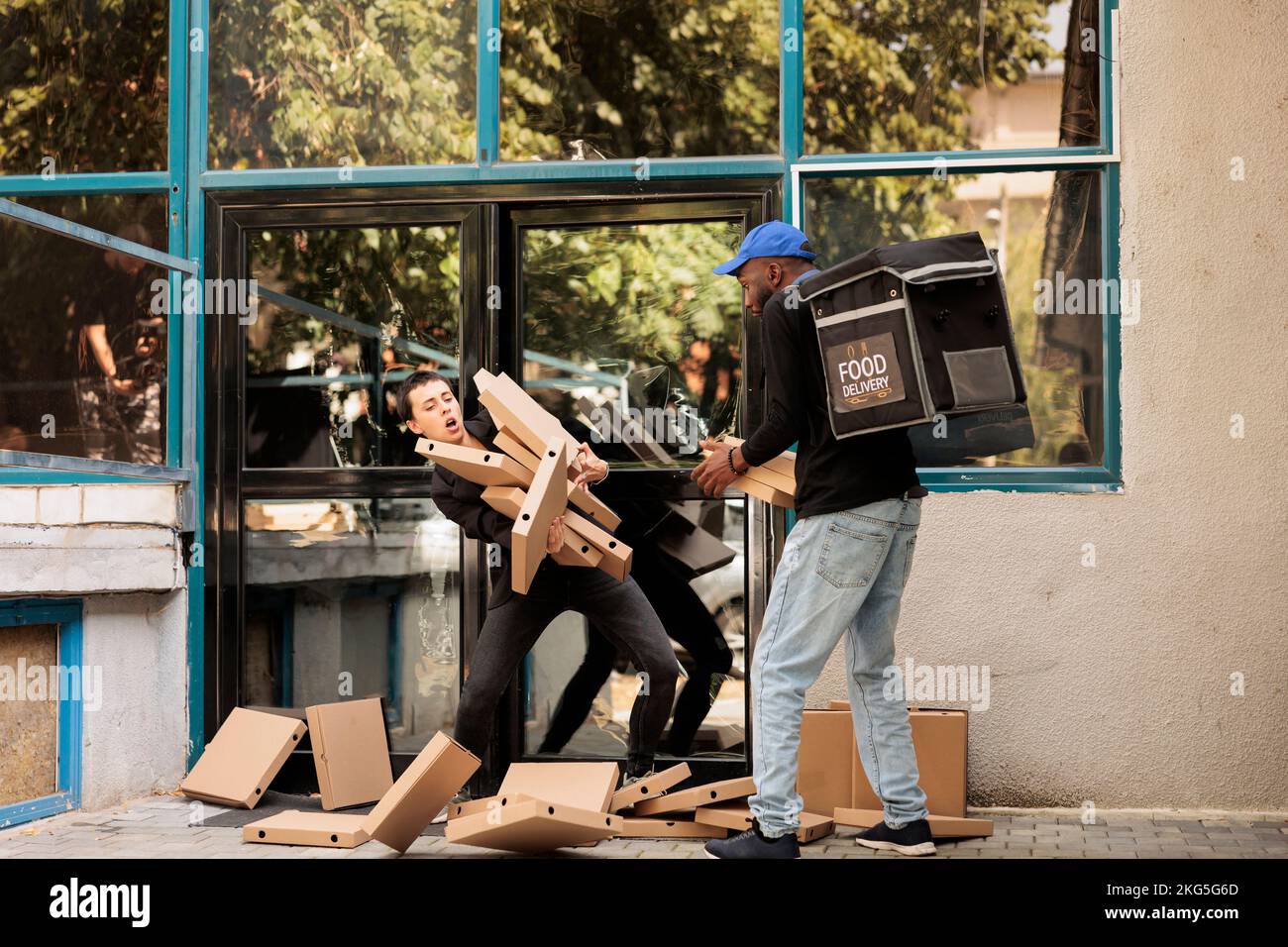 Delivery man falling stack boxes hi-res stock photography and images ...