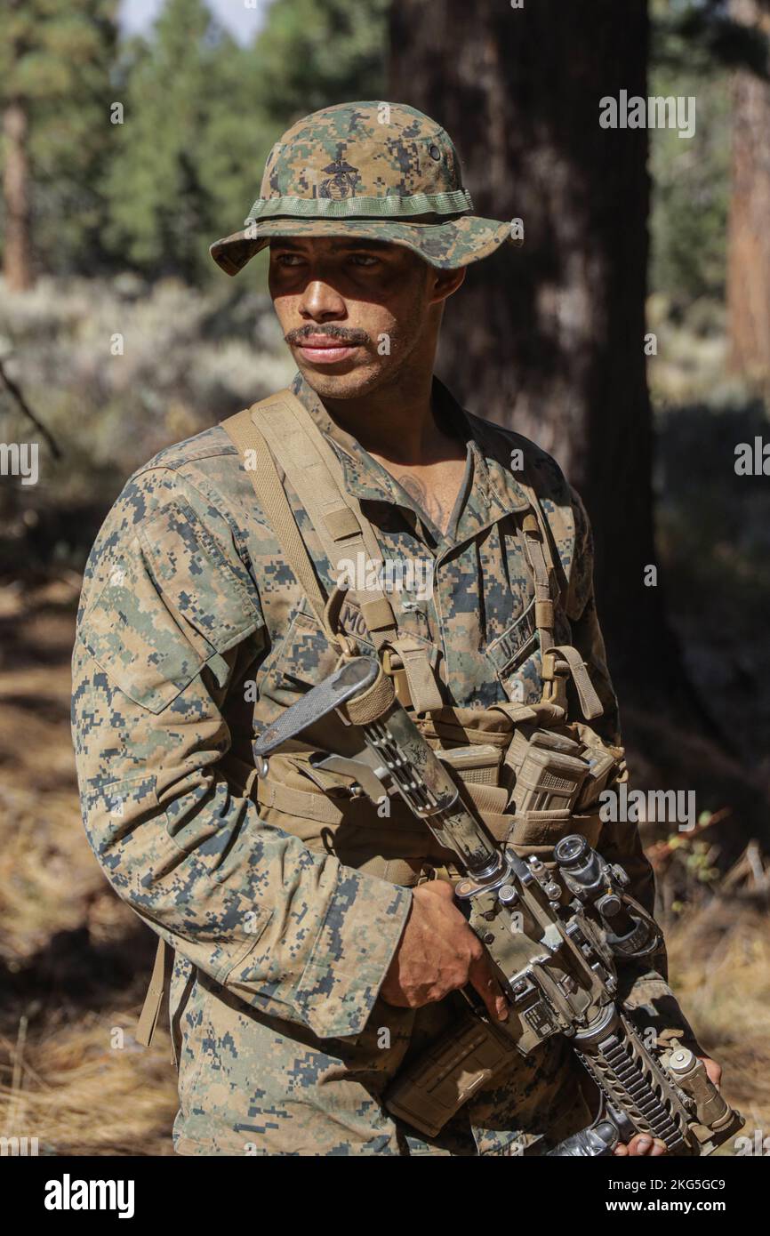U.S. Marine Pfc. Gianni Moore, a radio operator with Echo Company, 2nd ...