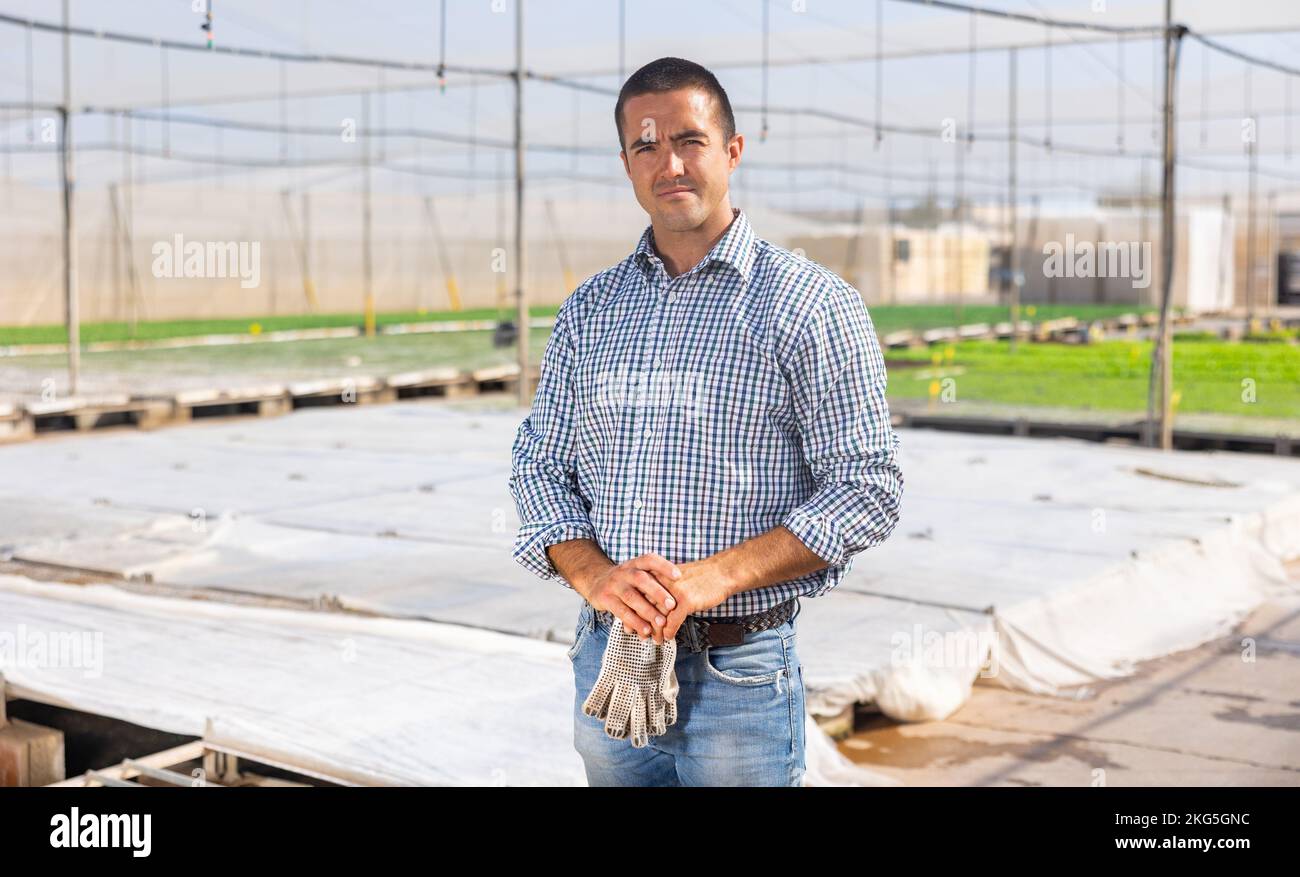 Positive spanish man standing hi-res stock photography and images - Alamy