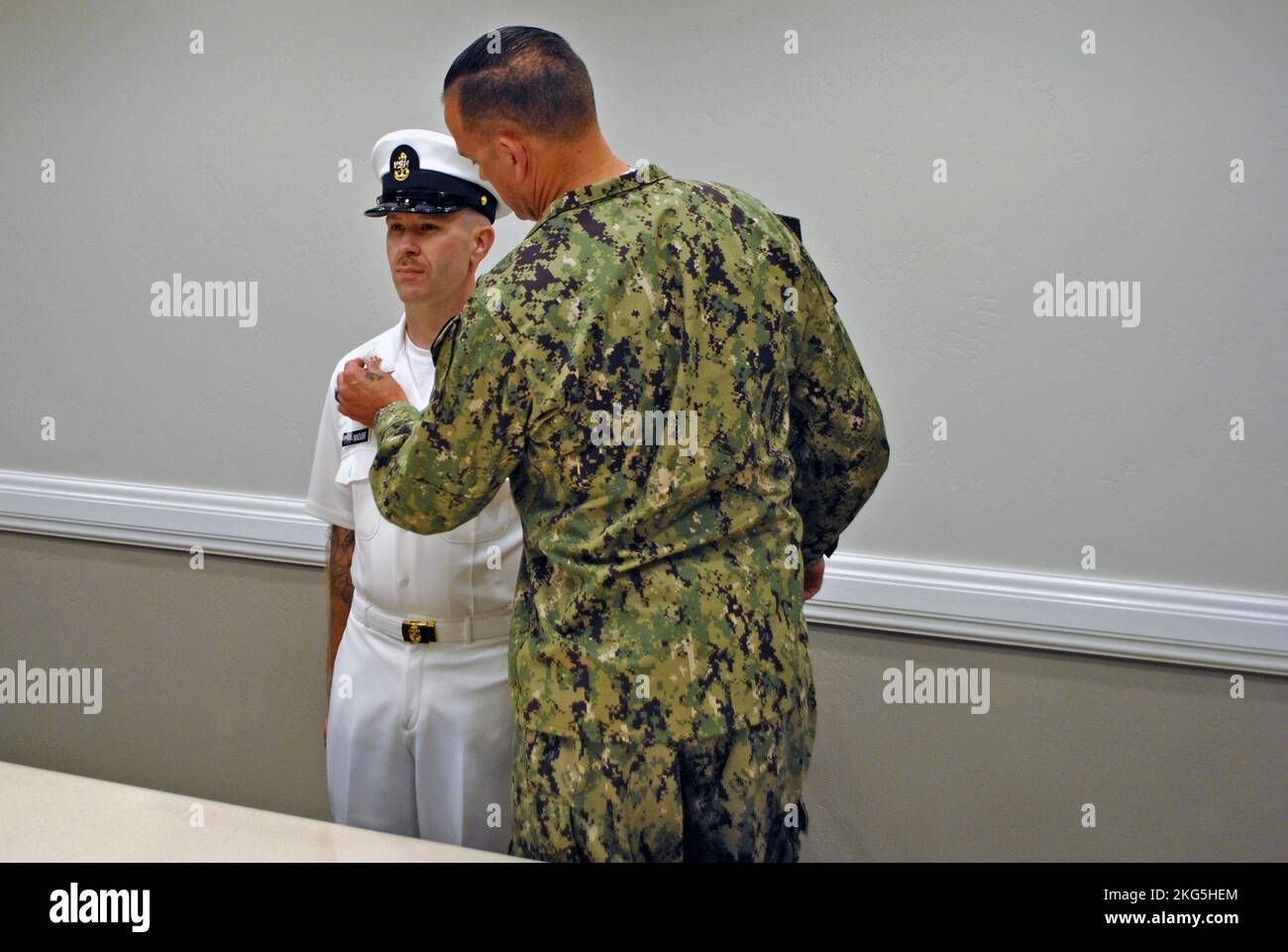 Navy Chief Petty Officer Eugene Nixdorf (San Antonio MEPS) is inspected ...