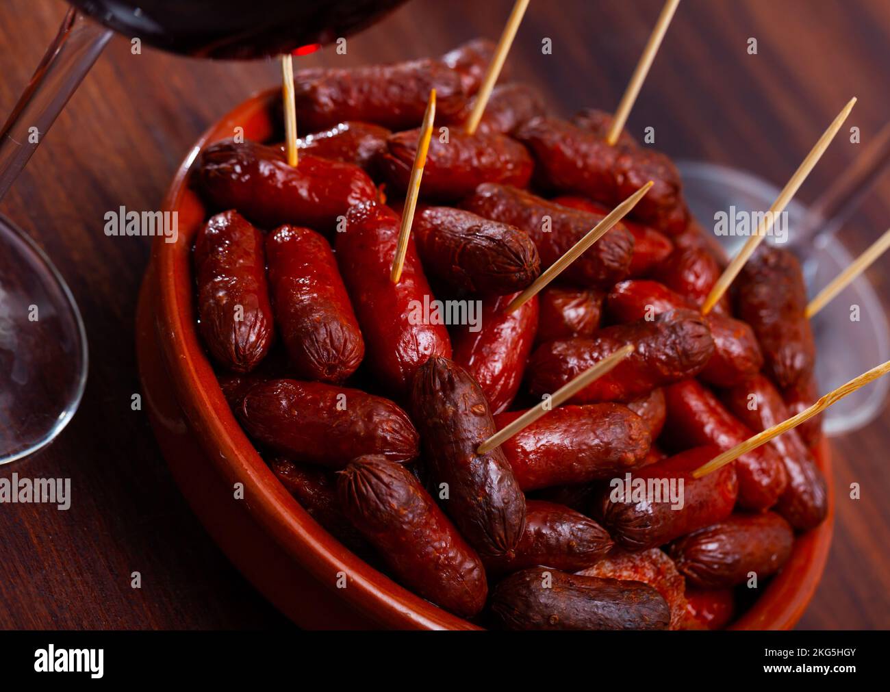 Hot spanish sausages chistorritas on skewers Stock Photo - Alamy