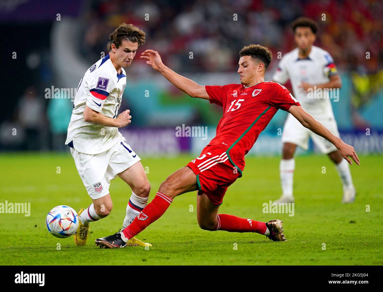 USA's Brenden Aaronson (left) and Wales' Ethan Ampadu battle for the ...