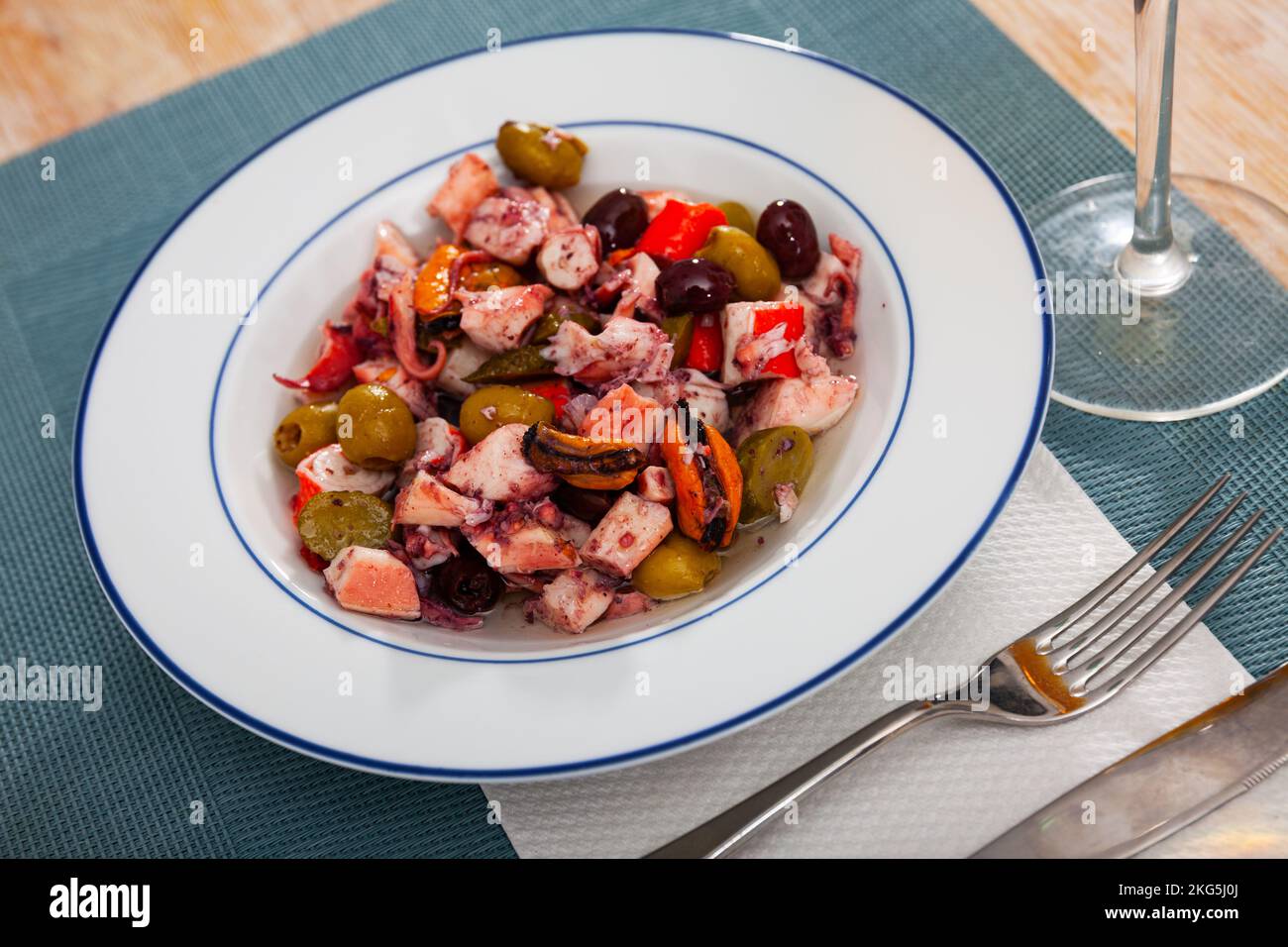 Delicious salad from variety of seafood with chopped vegetables ...