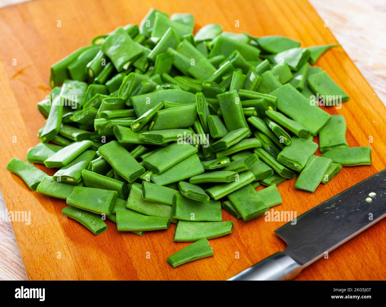 Chopped raw flat beans Stock Photo - Alamy