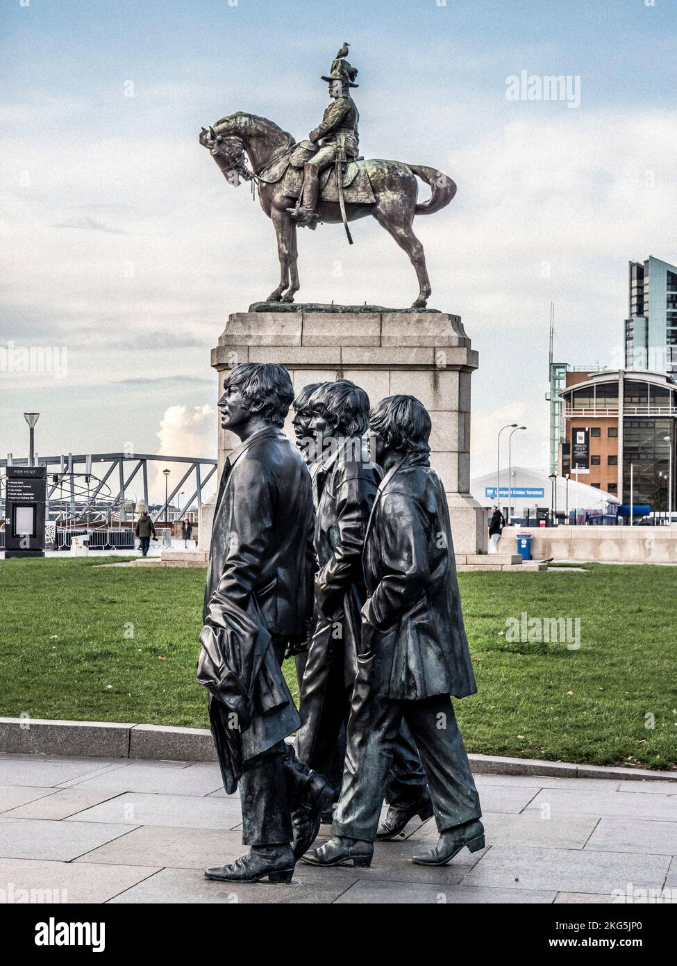 Street scene in Liverpool with the bronze statues of the Beatles pop ...