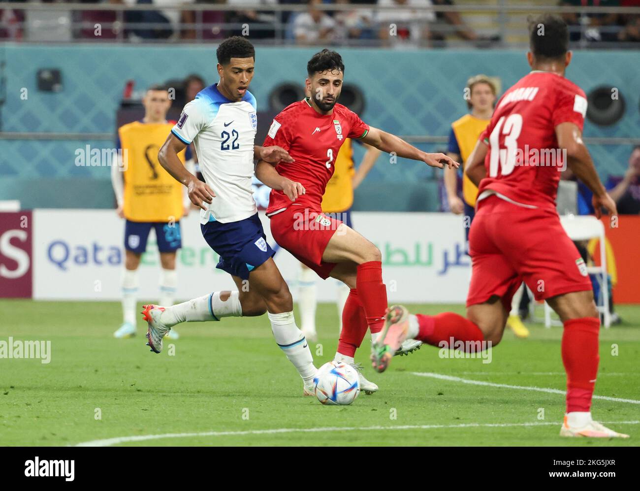 Jude Bellingham of England, Sadegh Moharrami of Iran during the FIFA ...