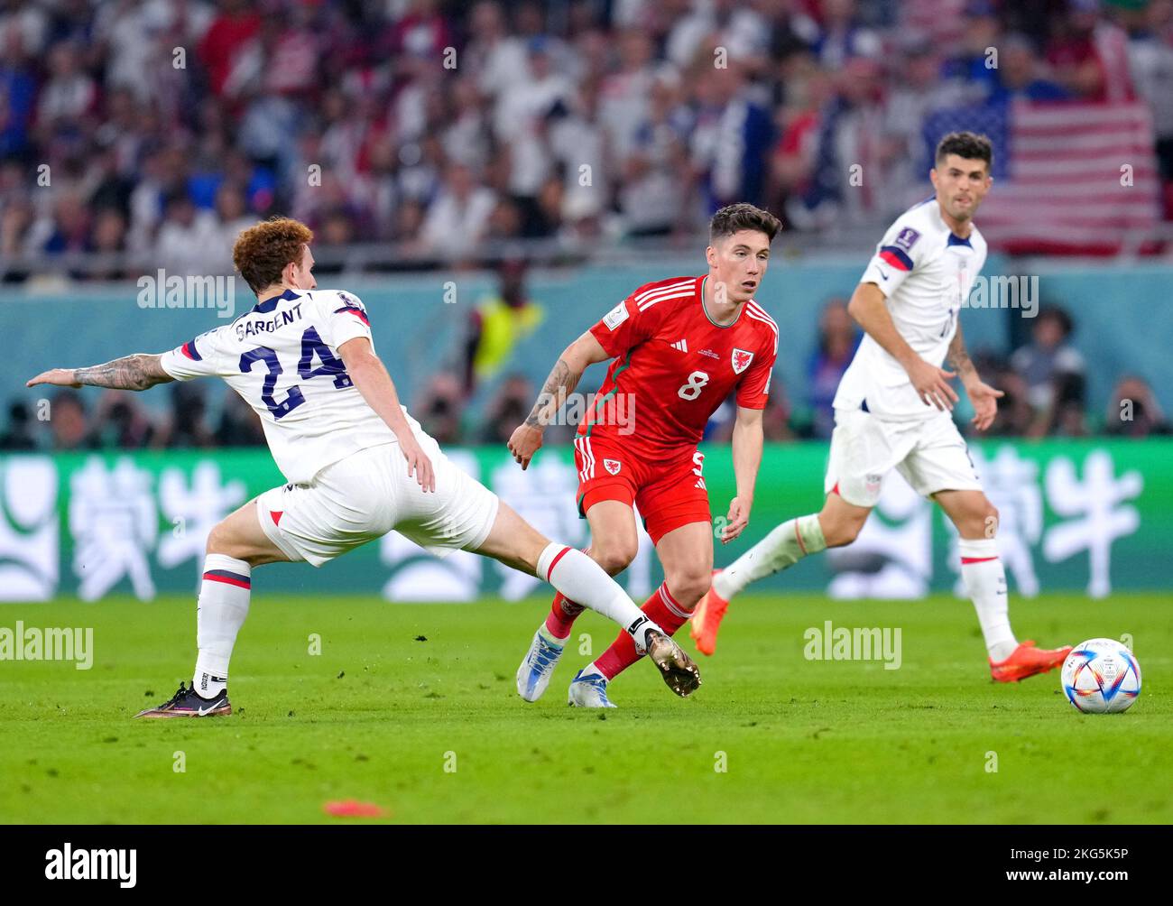 USA's Josh Sargent (left) and Wales' Harry Wilson battle for the ball ...
