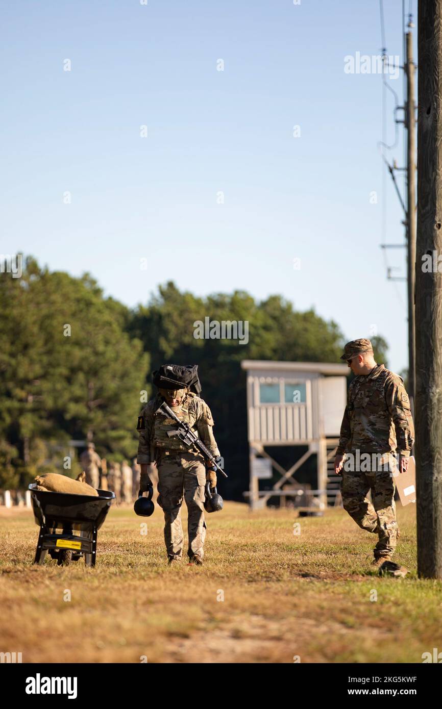 A member of Squad 1, representing the U.S Army Forces Command, pulls a ...