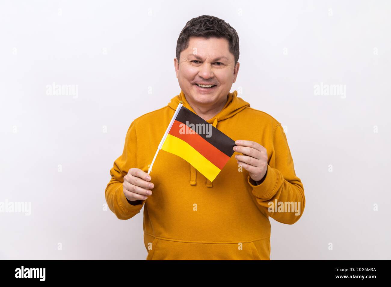 Man hand holding waving germany hi-res stock photography and images - Alamy