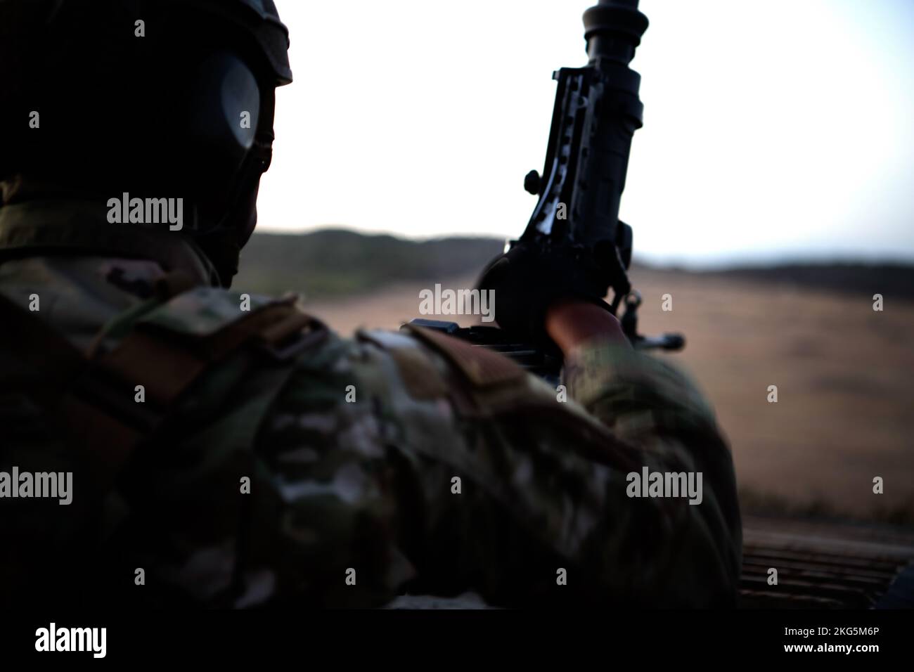 U.S. Air Force Airman First Class Devonte Wartell clears a M249 light ...
